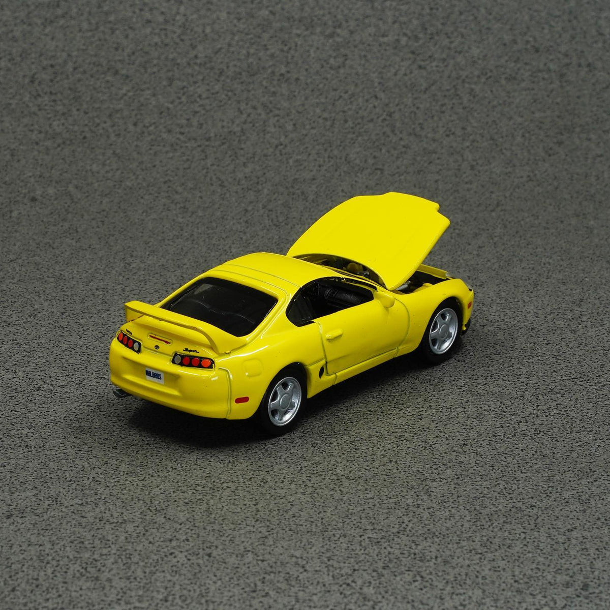 Auto World 1/64 1996 Toyota Supra Yellow Asia Special Edition – Flipn ...